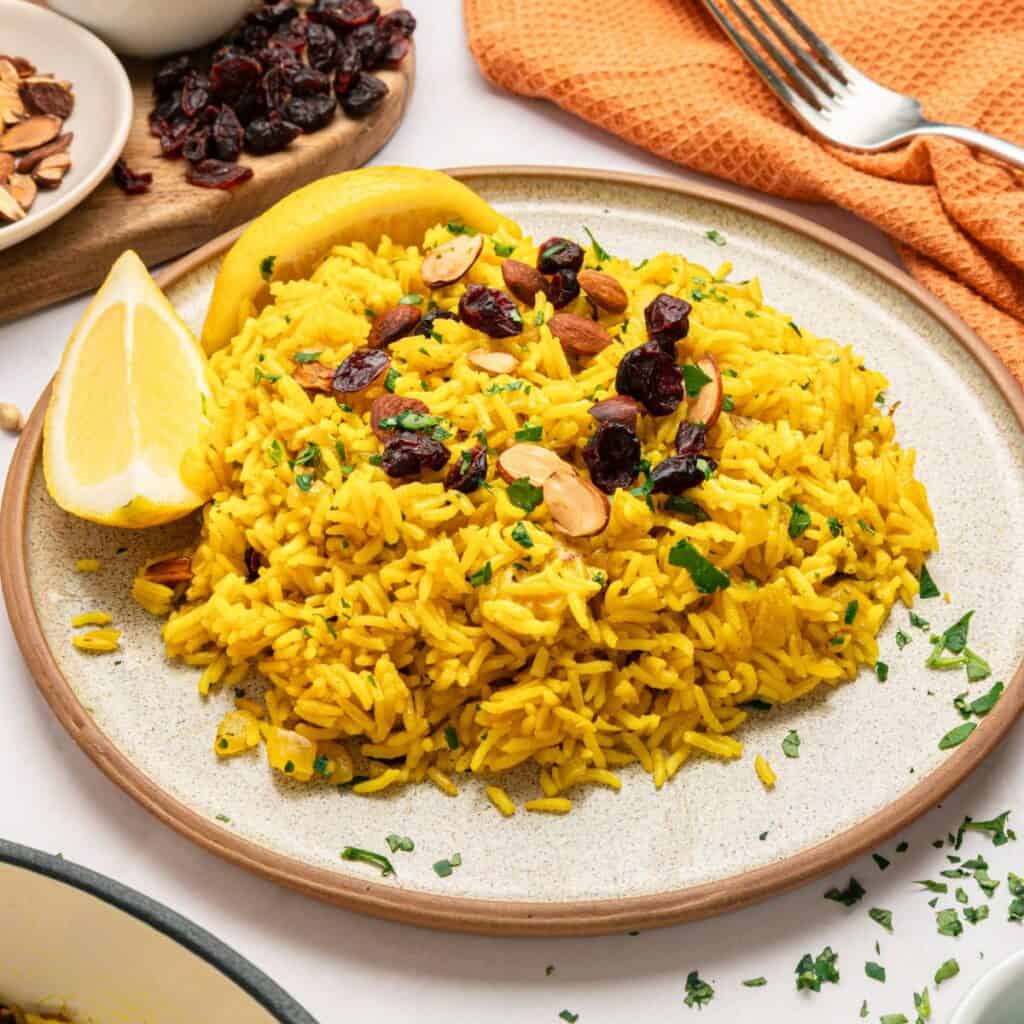 Mediterranean Rice with Turmeric, Almonds, and Raisins - A Sweet Thyme