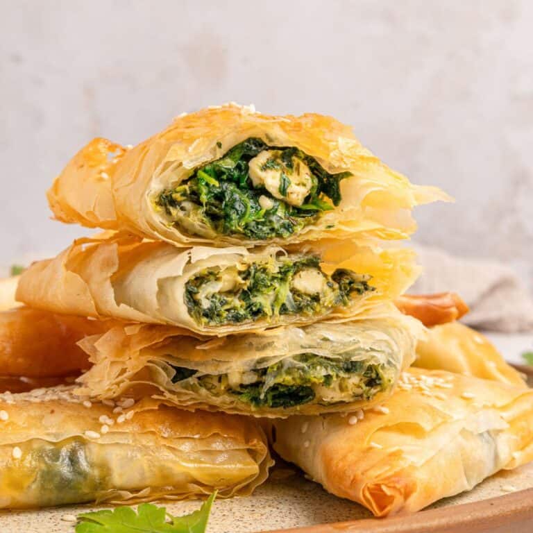 Easy Greek Spanakopita Triangles with Spinach and Feta - ASweetThyme.com